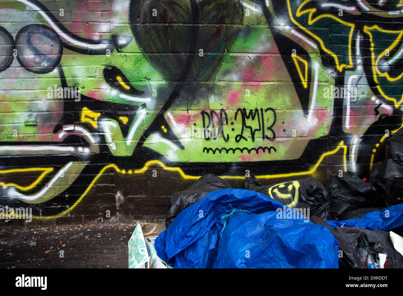Graffiti on walls in an inner city urban area Stock Photo - Alamy