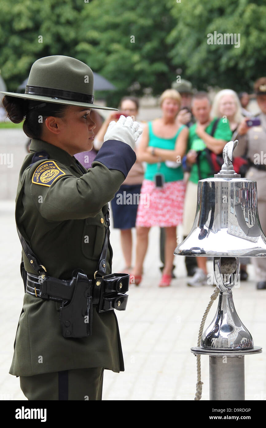 This photograph shows U.S. Customs and Border Protection performing ...