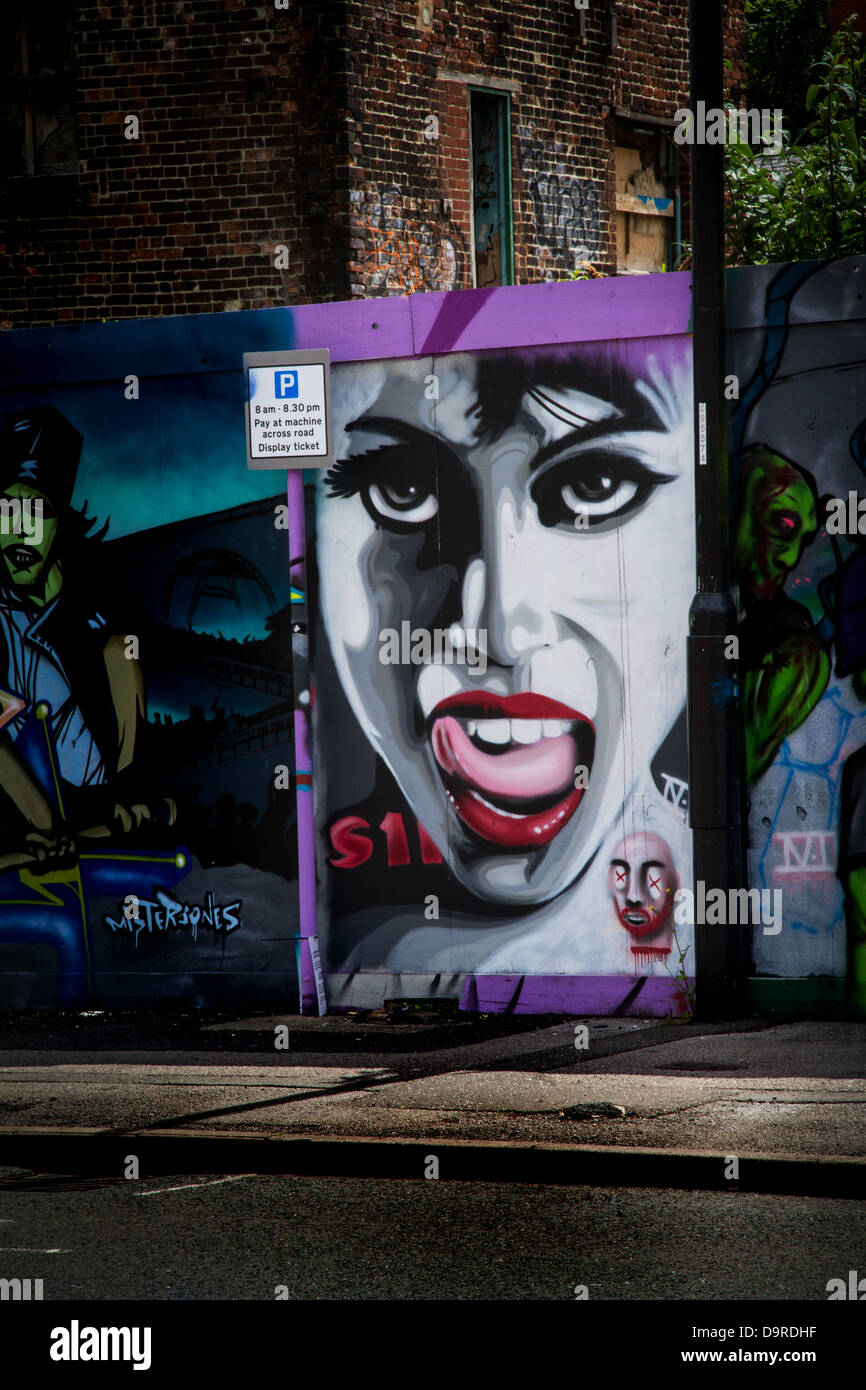 Graffiti on walls in an inner city urban area Stock Photo - Alamy