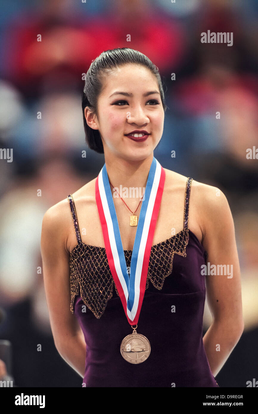 Michelle Kwan wearing her gold medal at the 2000 US National Figure ...