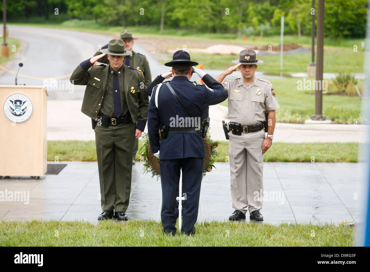 The photograph captures the memorial dedication of the CBP Global ...