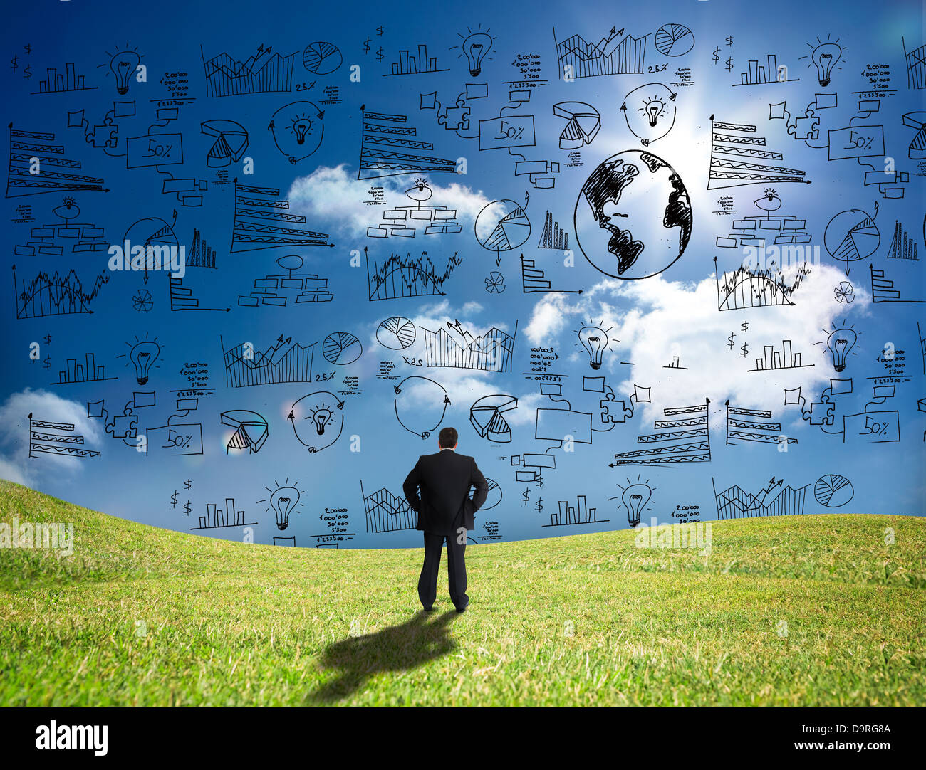 Businessman looking at graphs and data in the sky Stock Photo - Alamy