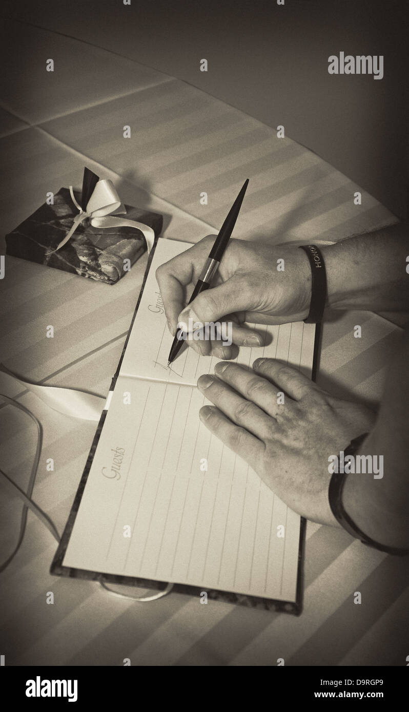 Signing hands hi-res stock photography and images - Alamy