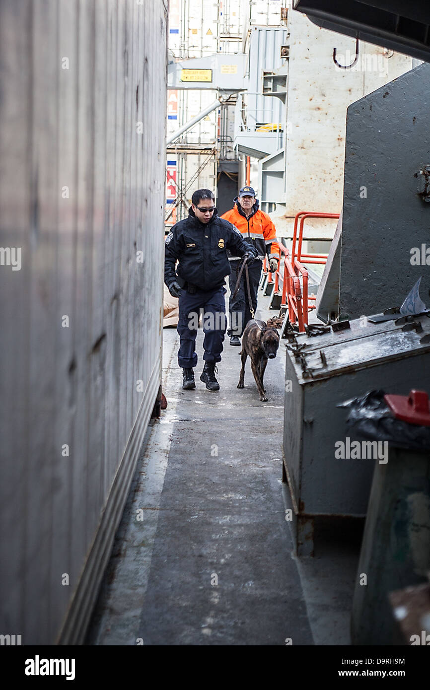 This photograph shows U.S. Customs and Border Protection officers ...