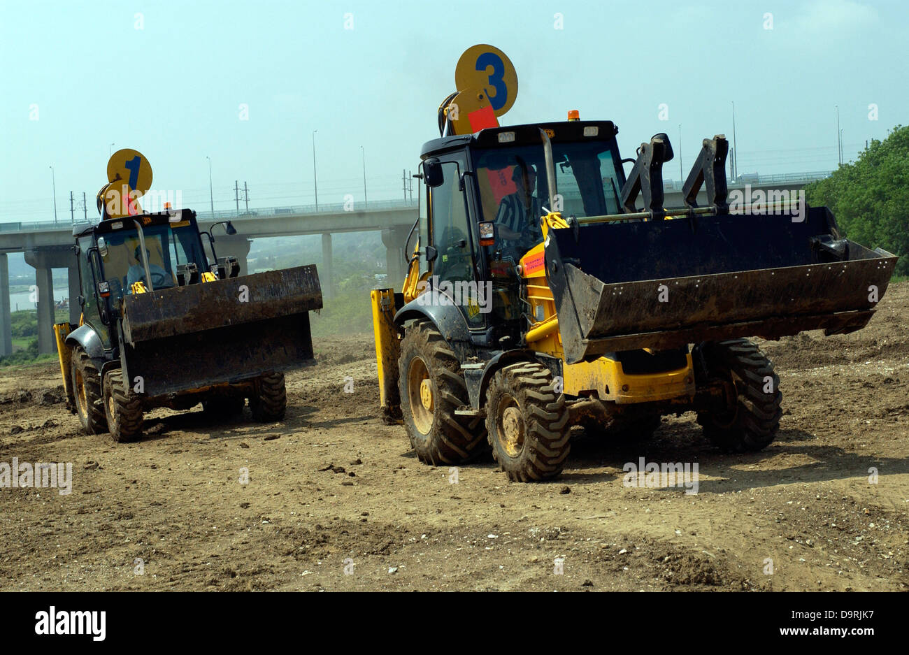 JCB racing and stunts in Diggerland Strood Kent Stock Photo - Alamy