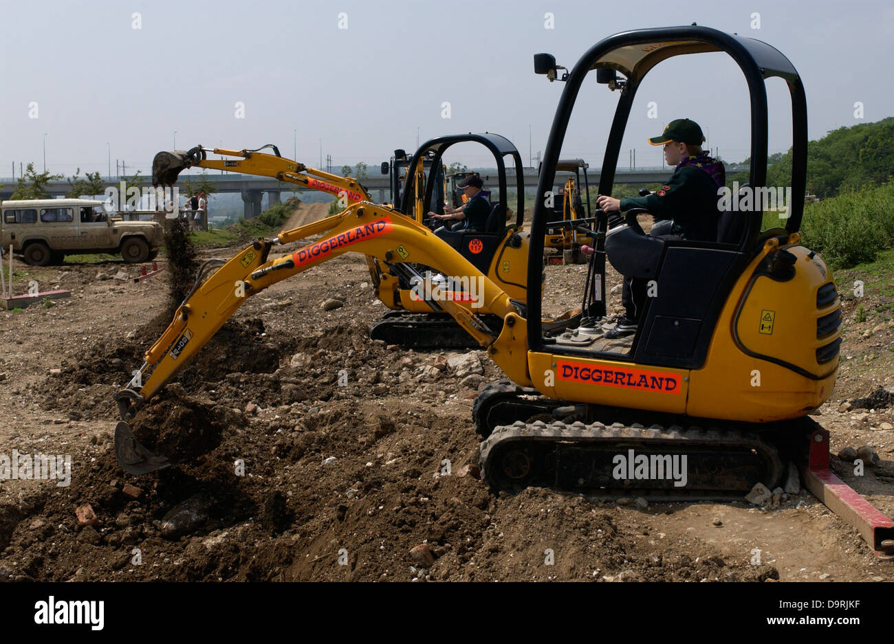 JCB racing and stunts in Diggerland Strood Kent Stock Photo - Alamy
