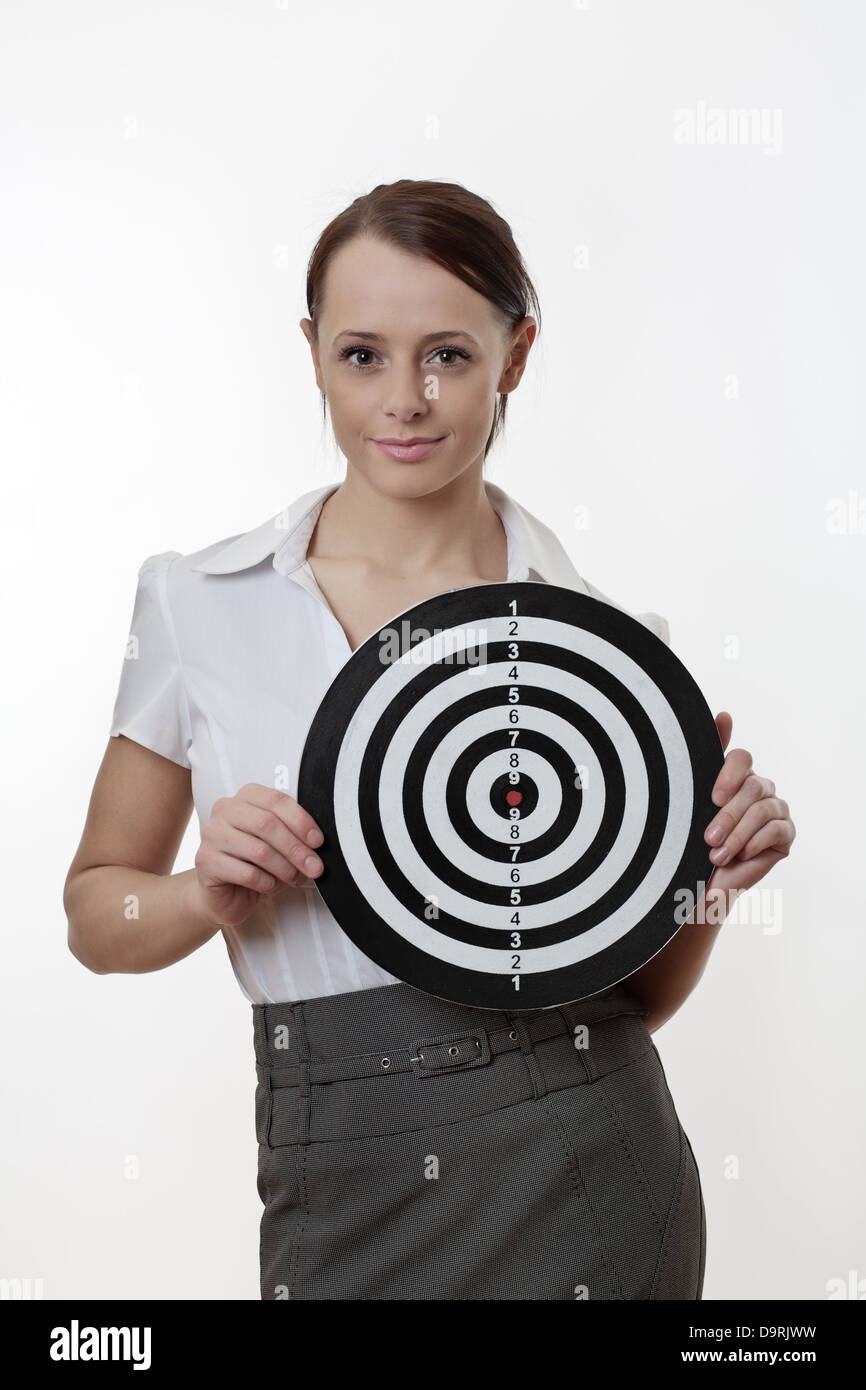woman in a business out fit holding up a target Stock Photo - Alamy
