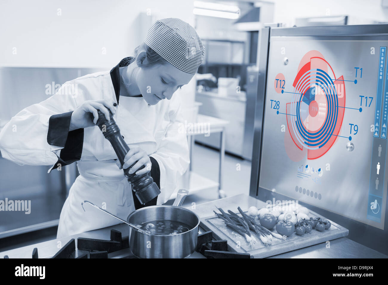 Chef cooking for a restaurant with futuristic interface Stock Photo - Alamy