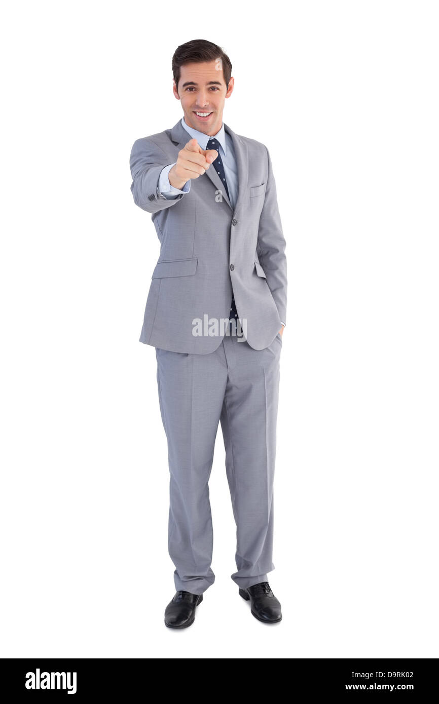 Smiling businessman pointing at the camera Stock Photo - Alamy