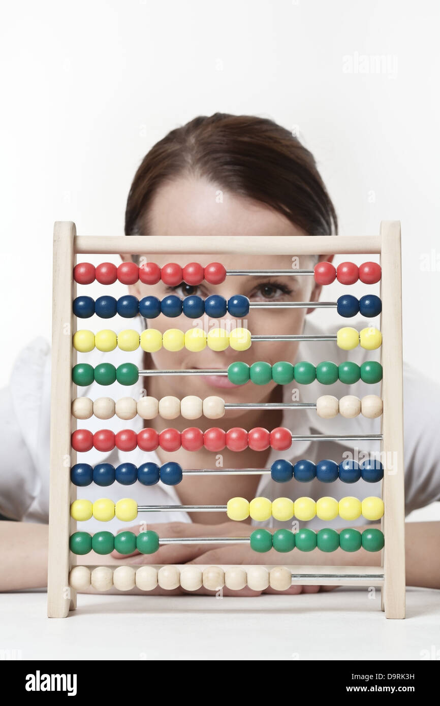 Woman using abacus hi-res stock photography and images - Alamy