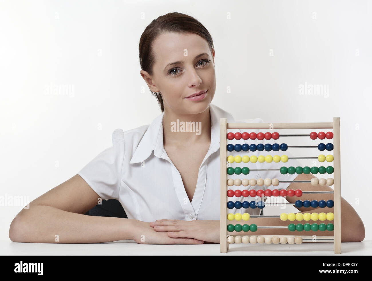 Woman using abacus hi-res stock photography and images - Alamy