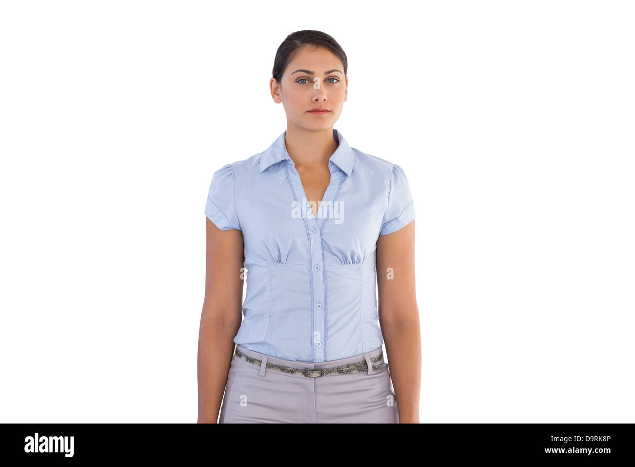 Serious businesswoman standing alone Stock Photo - Alamy