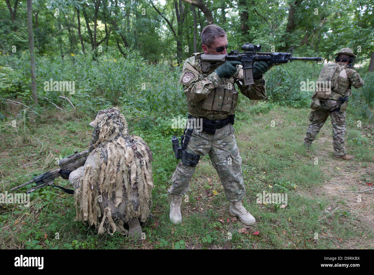 The photograph captures members of a Quick Reaction Force (QRF ...