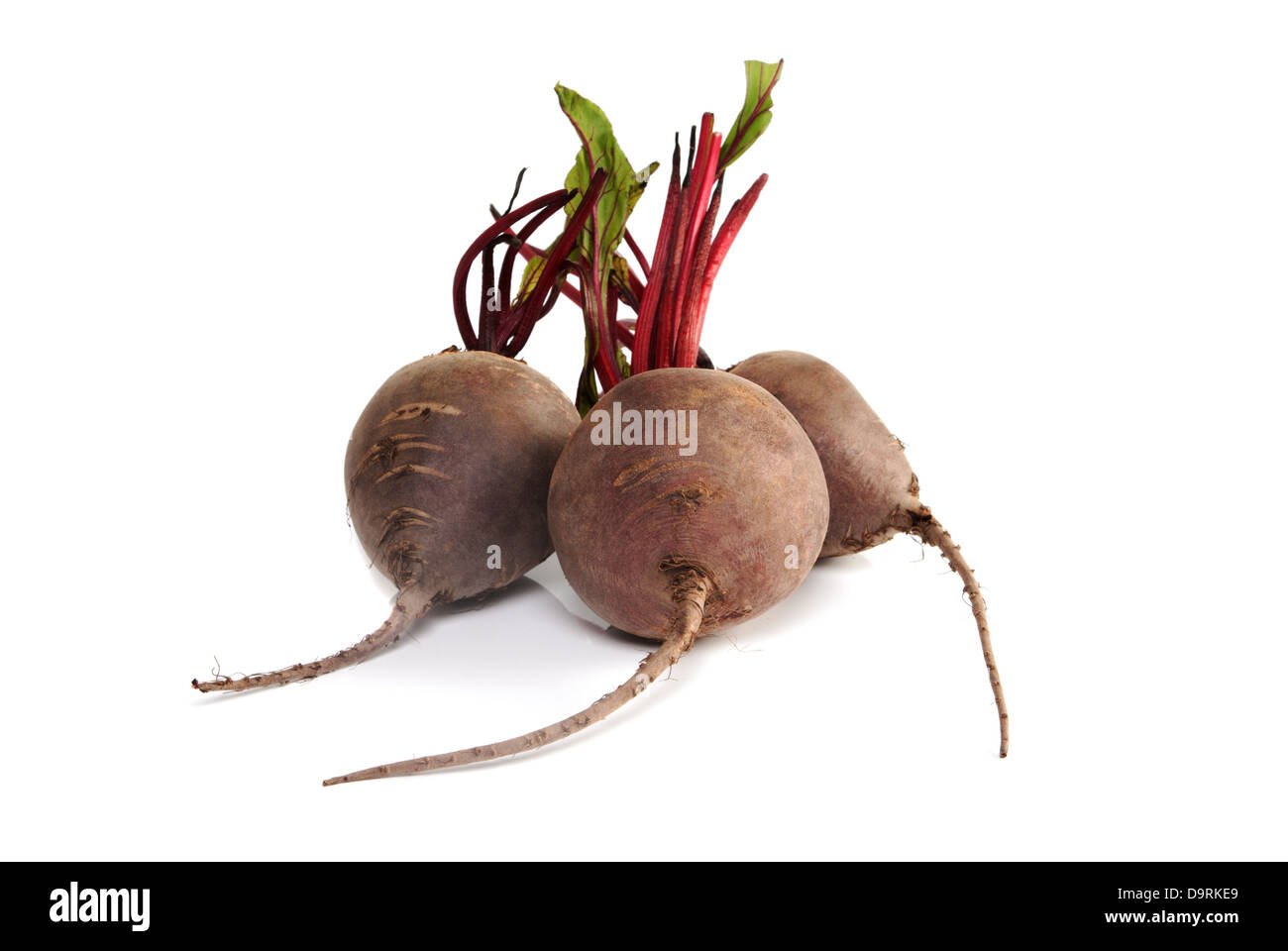 Bunch of raw beets isolated on white background Stock Photo - Alamy