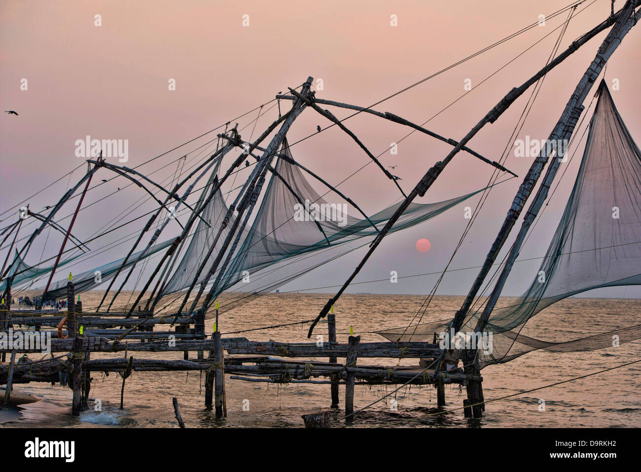 Chinese fish nets at sunset in Fort Cochin (Kochi) in Kerala, India ...