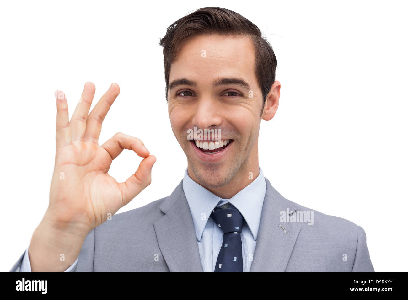 Successful businessman giving ok sign Stock Photo - Alamy