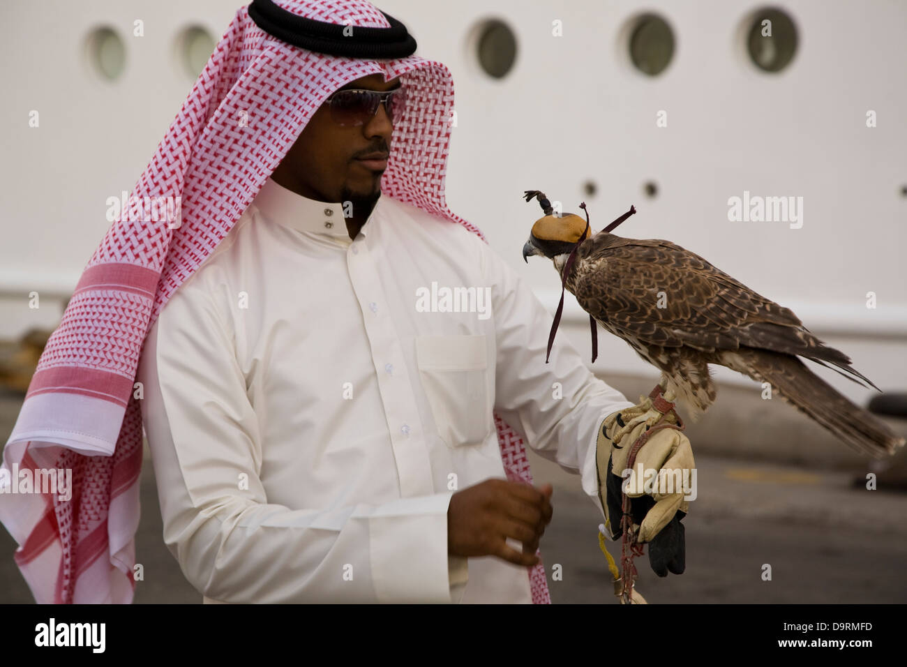 A falconer and his bird, Manama, Bahrain Stock Photo - Alamy