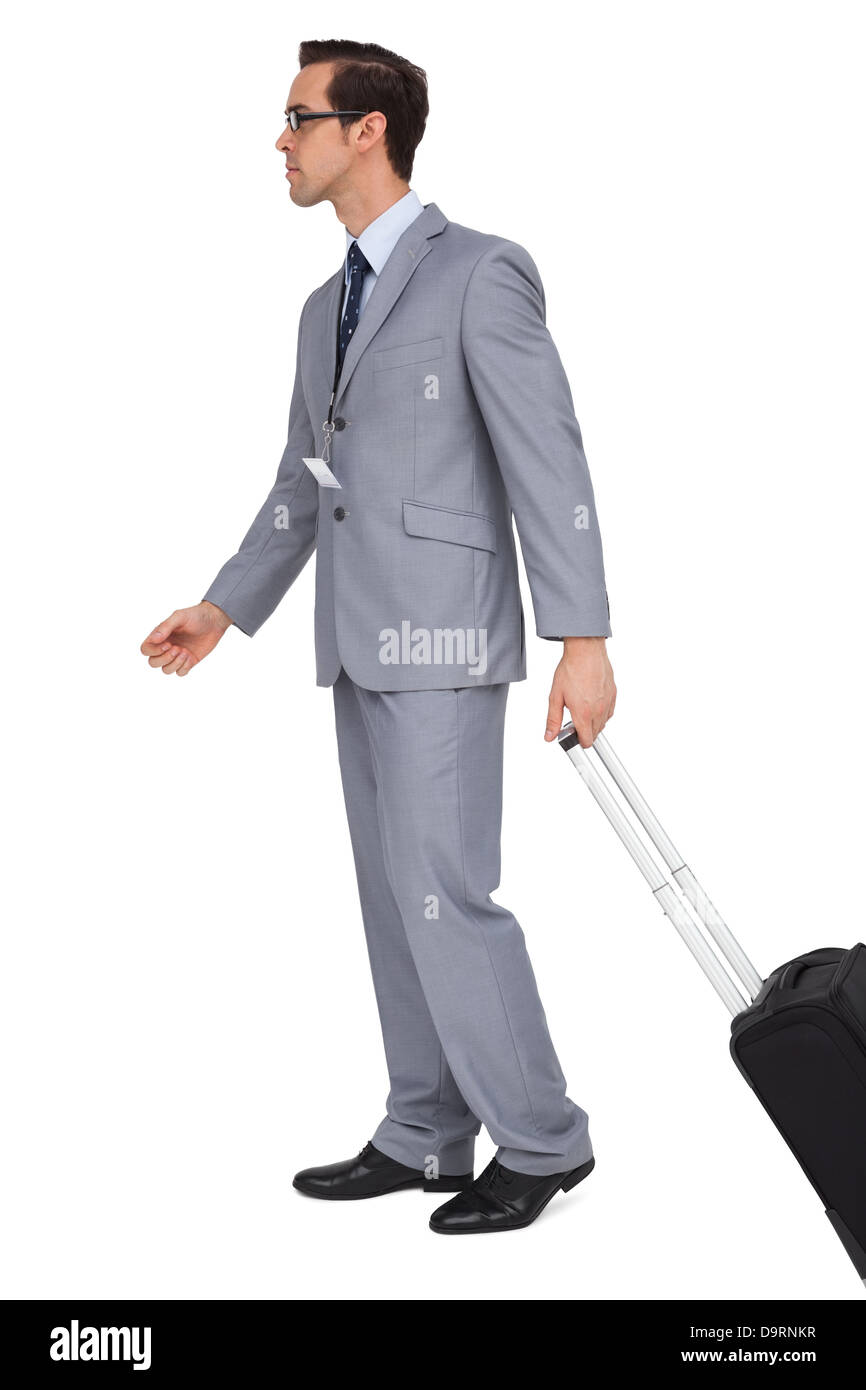 Man walking away with luggage hi-res stock photography and images - Alamy