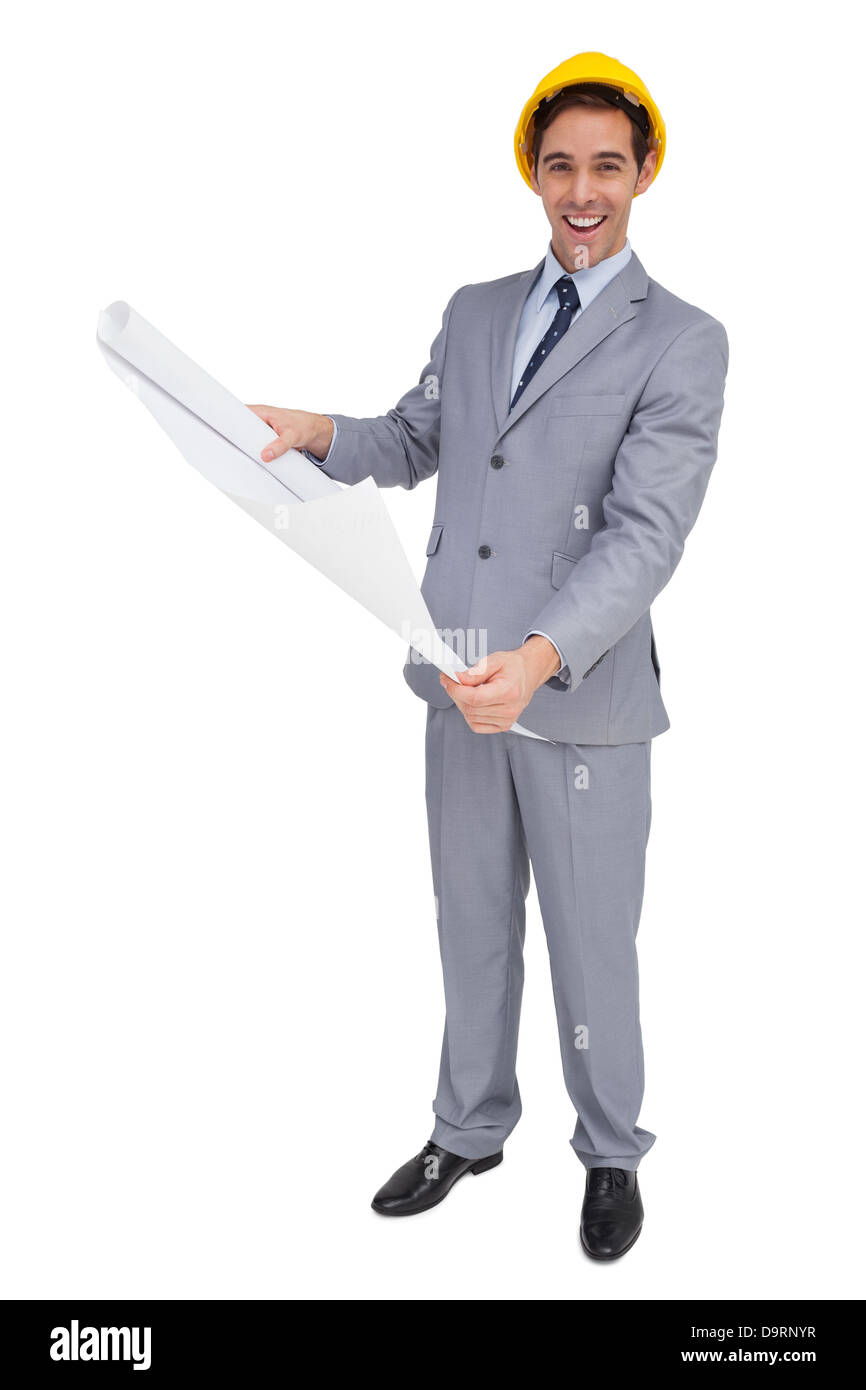 Smiling architect with hard hat holding plans Stock Photo - Alamy Smiling architect with hard hat holding plans Stock Photo - Alamy