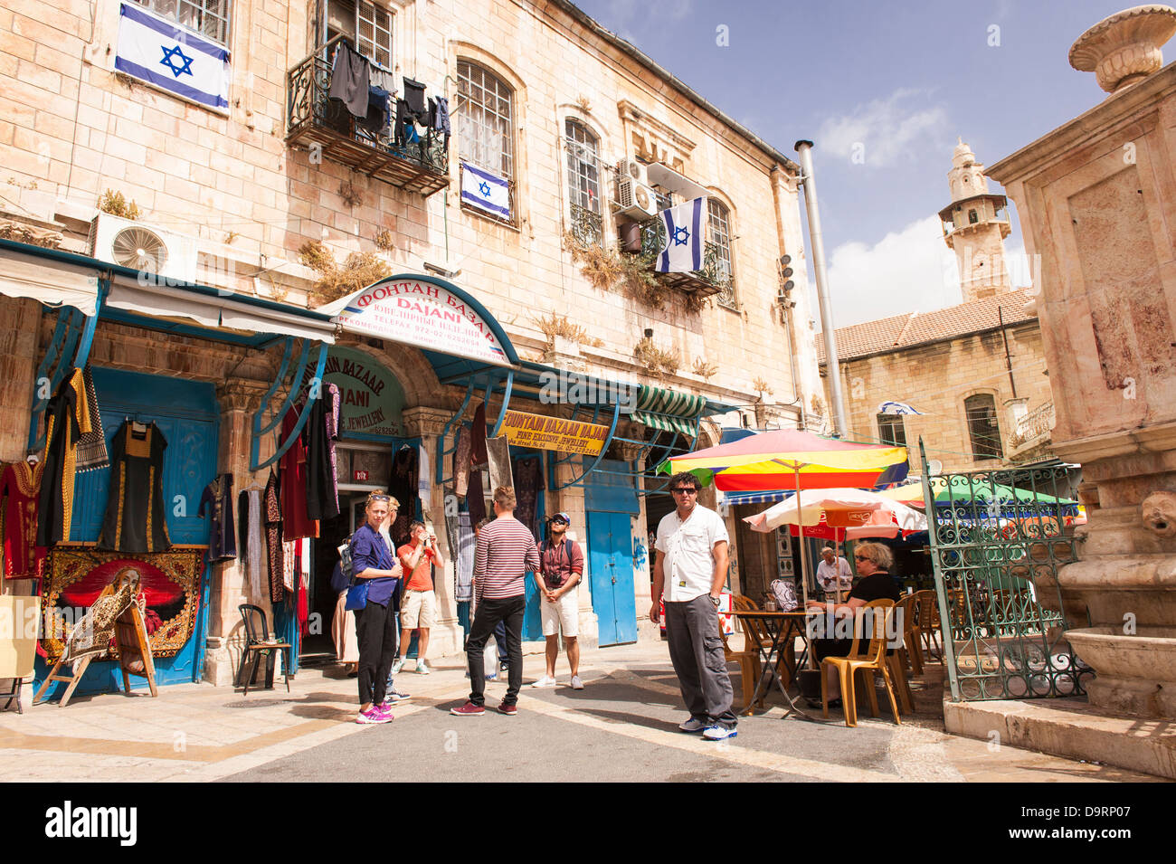 Israel Jerusalem Old City typical street scene the Fountain Bazaar Dajani clothes jewelery shop ...