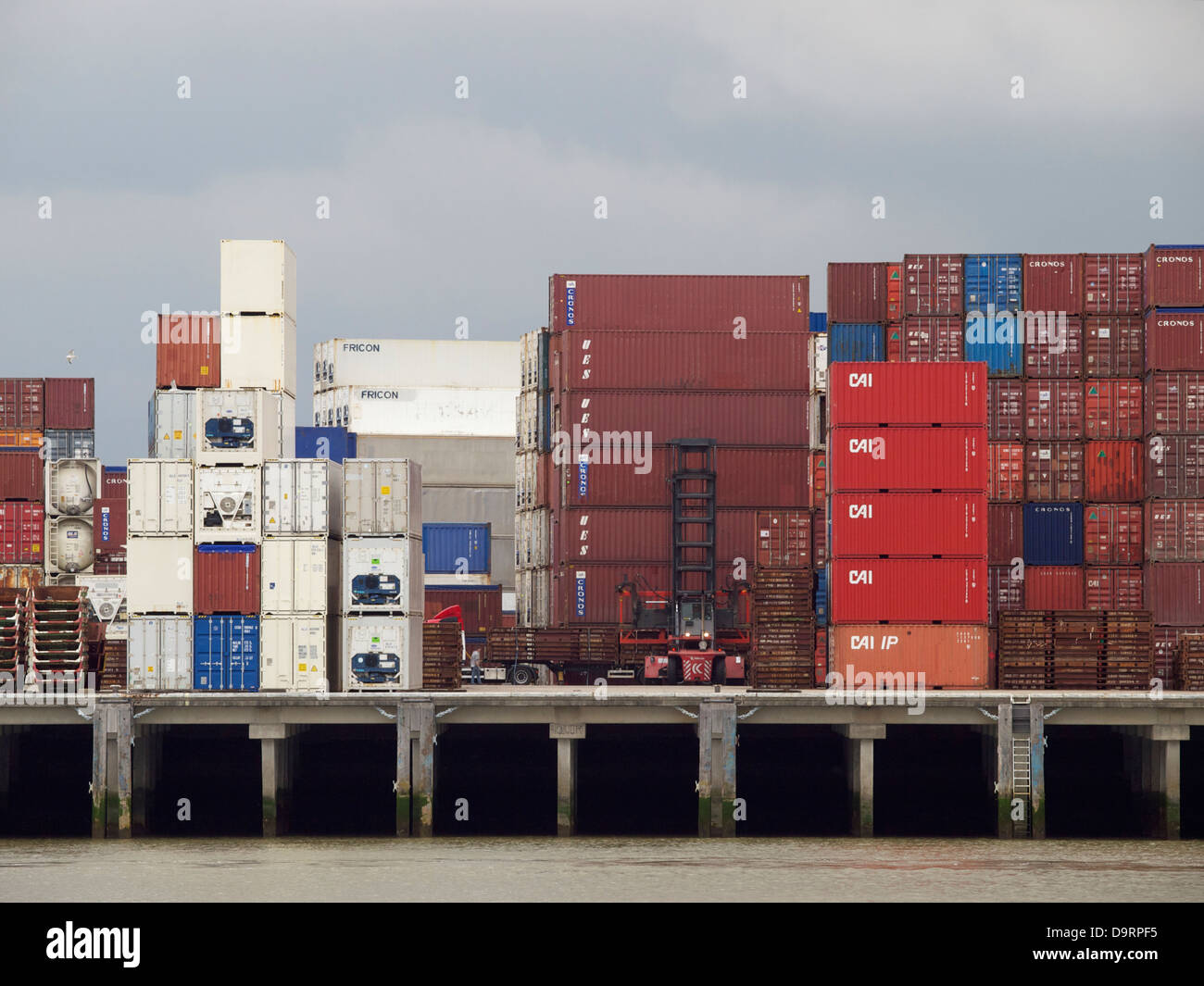 Many containers awaiting transit in the port of Rotterdam, the ...