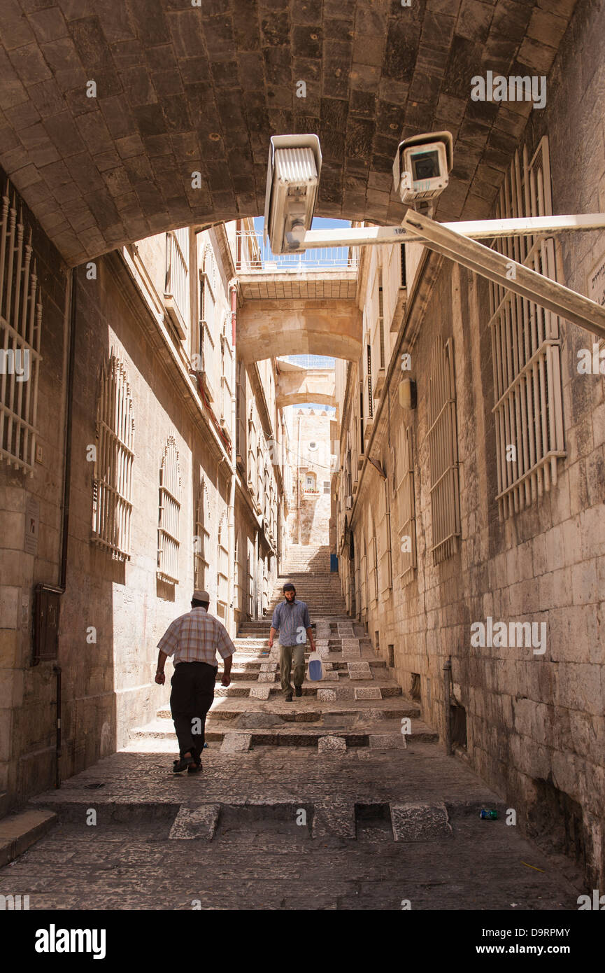 Israel Jerusalem Old City street lane road steps ramps cars bikes carts ...