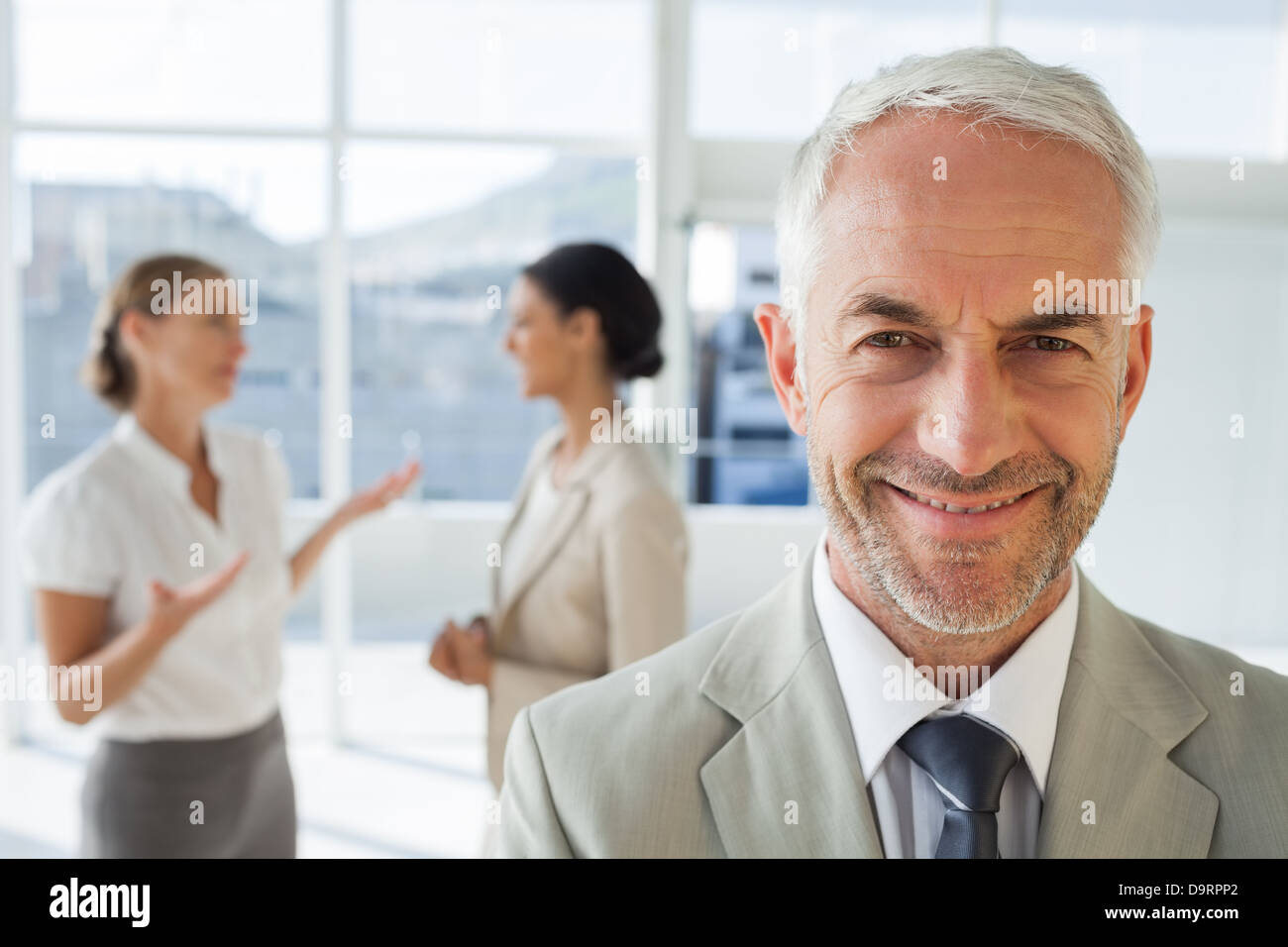 Smiling mature businessman stubble hi-res stock photography and images ...