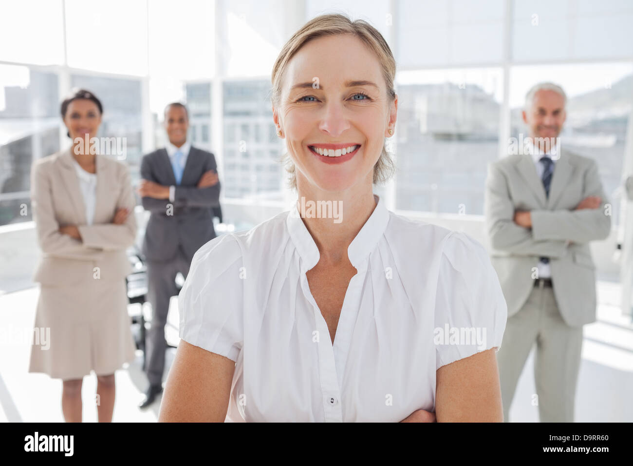 Standing arms folded hi-res stock photography and images - Alamy