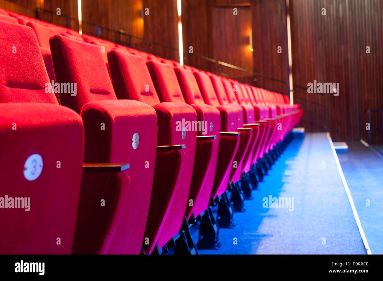 a row of seats in a theater Stock Photo - Alamy