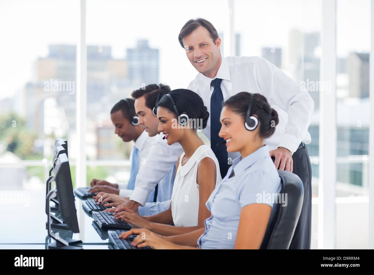 Mature manager looking camera hi-res stock photography and images - Alamy