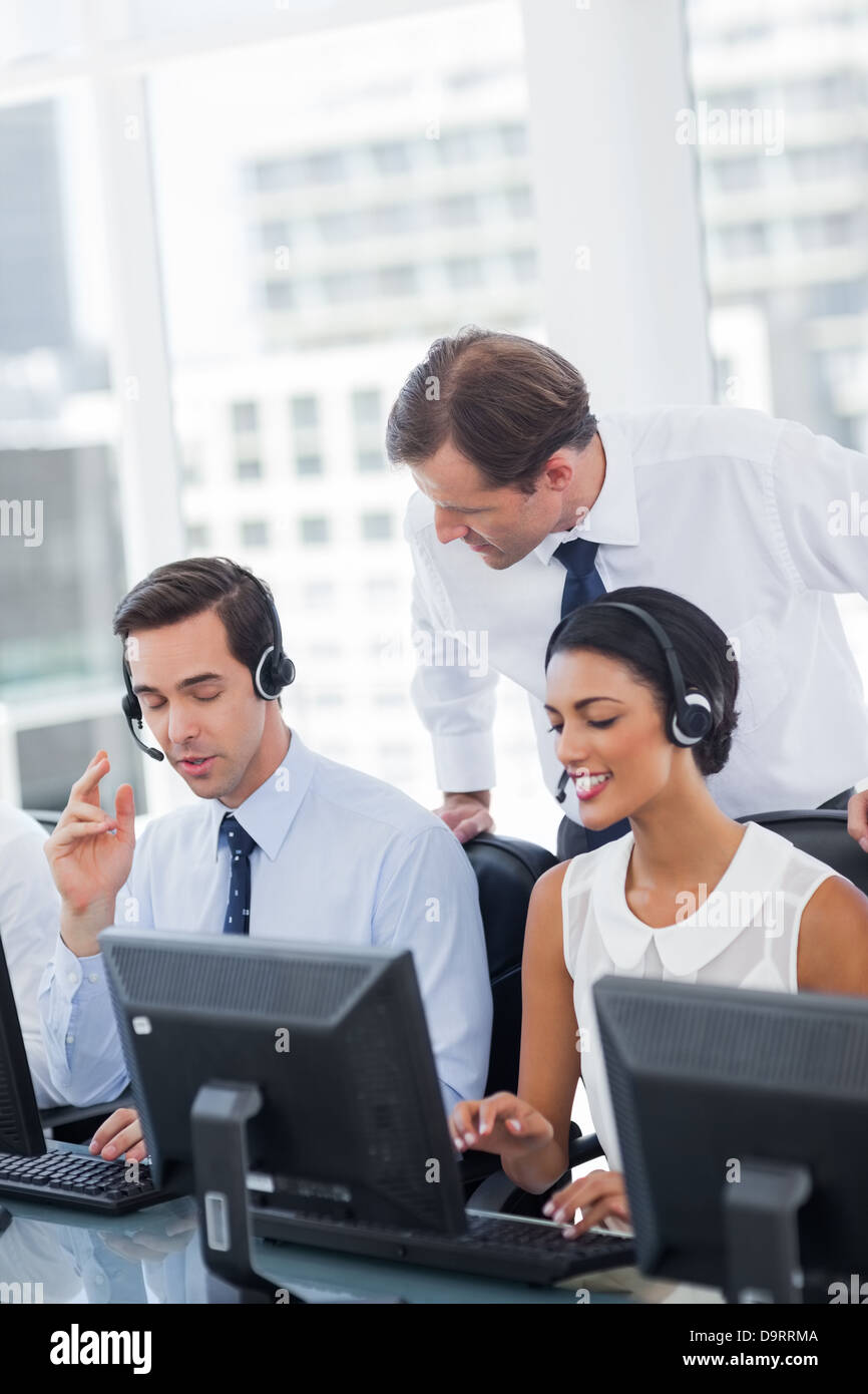Supervisor talking employees hi-res stock photography and images - Alamy