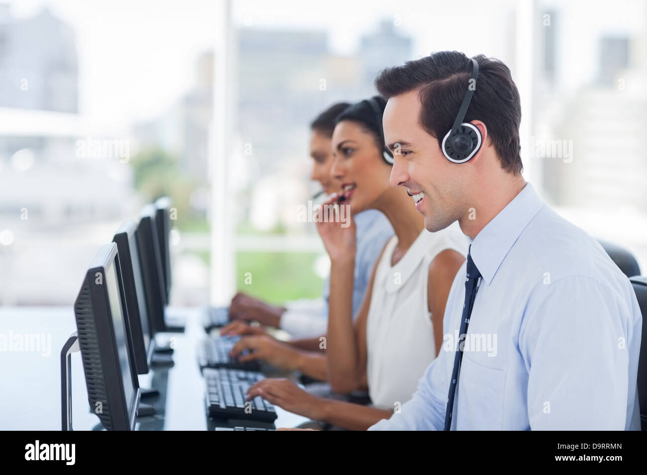 Woman helping call center agent hi-res stock photography and images - Alamy