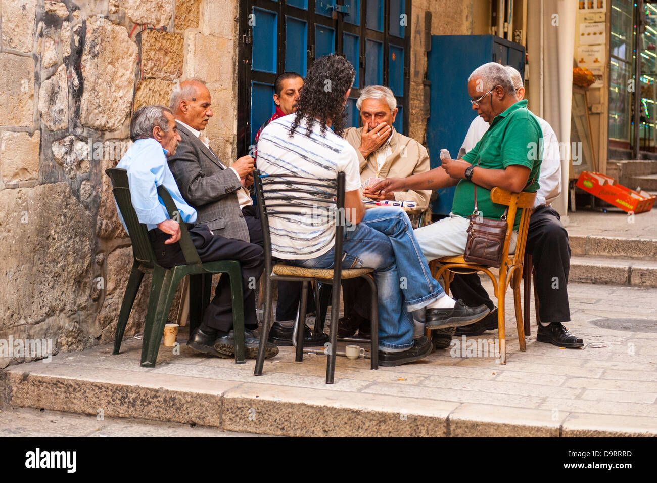 Israel Old City Jerusalem street scene intense group of Arab Muslim men ...