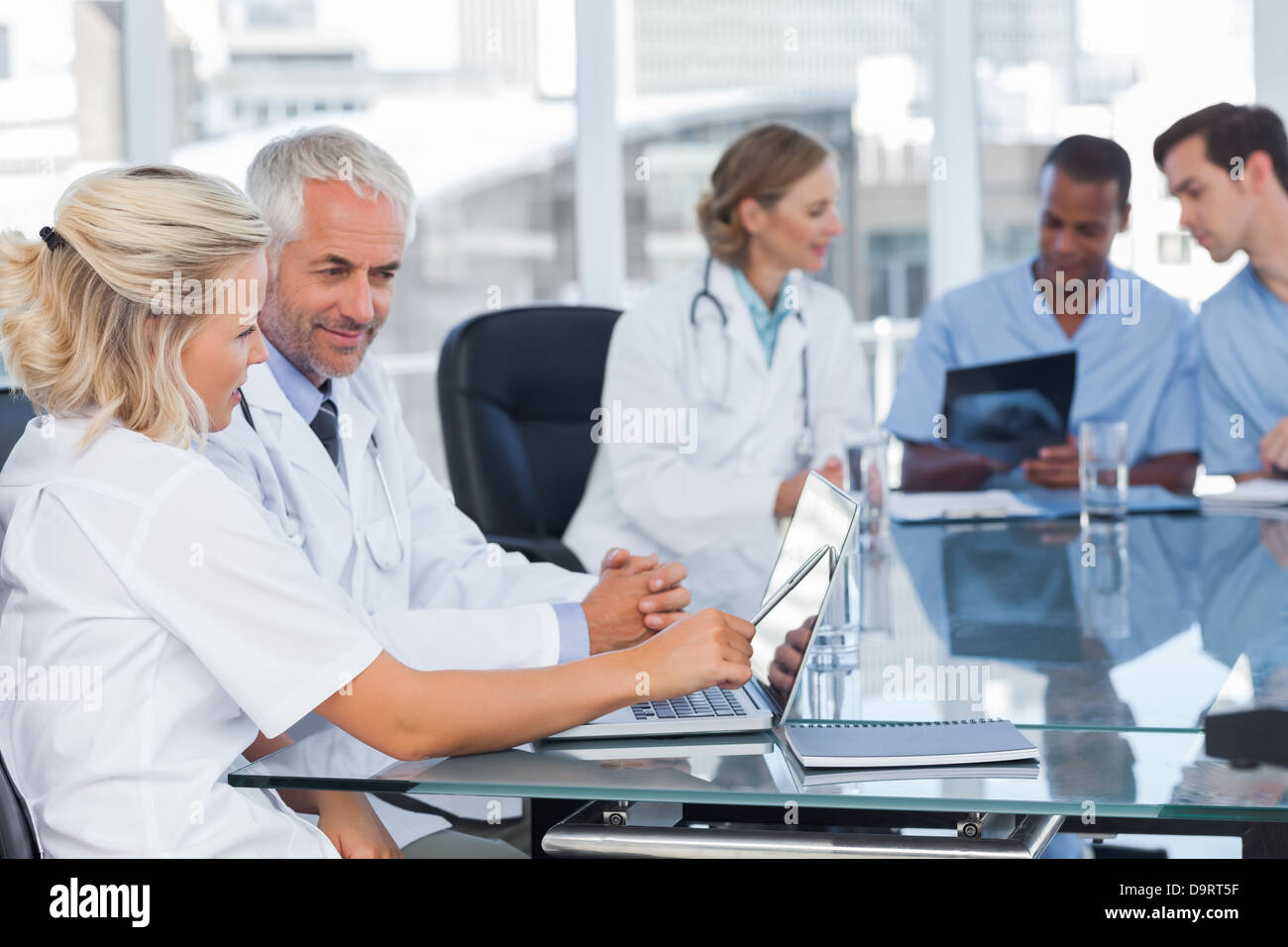 Medical doctors team using laptop hi-res stock photography and images ...