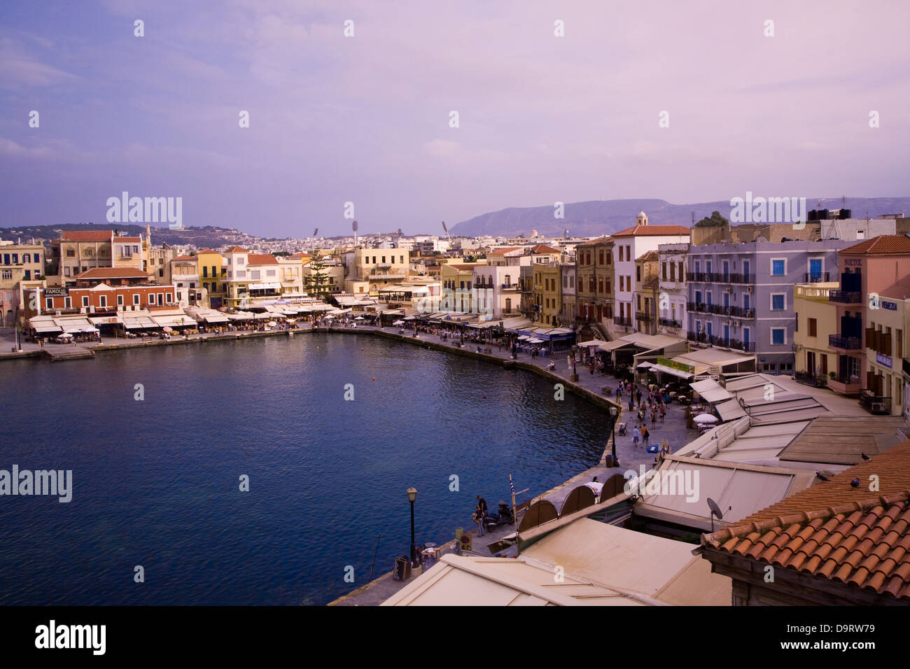 A broad promenade lined with tourist shops and cafes circles the lovely ...