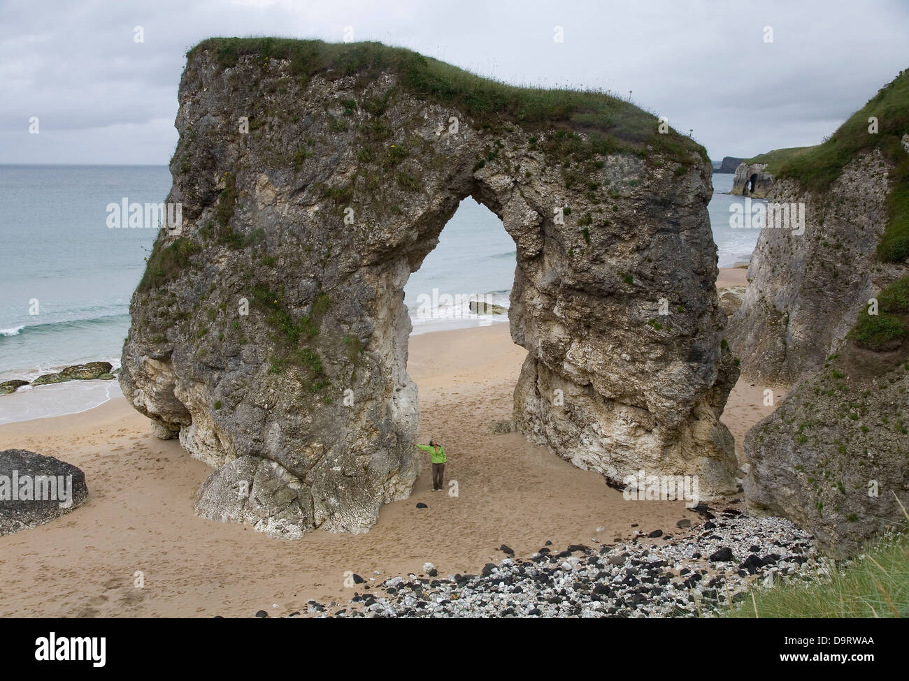 free-standing arch on White Rocks Beach. Bushmills, Antrim Coast in ...