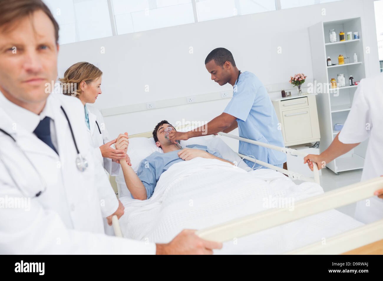 Doctors give oxygen to the patient Stock Photo - Alamy