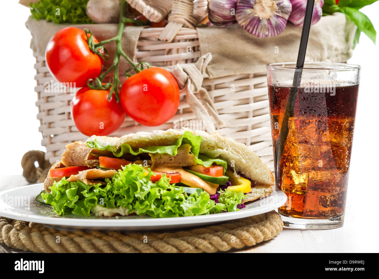 Kebab made of vegetables and meat served with cold cola Stock Photo - Alamy