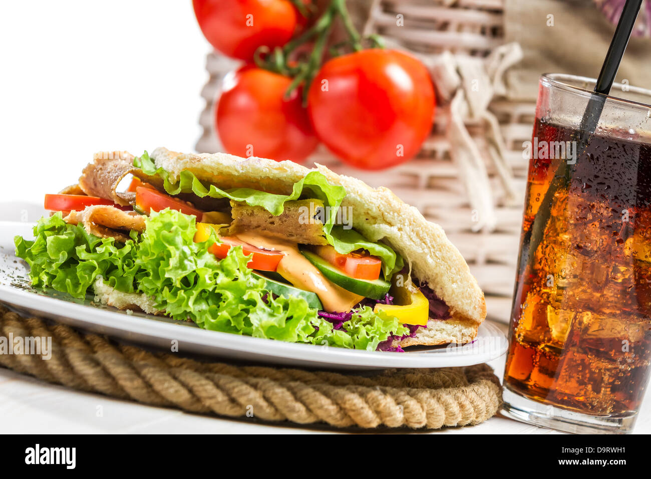 Closeup of kebab served with cold cola Stock Photo - Alamy