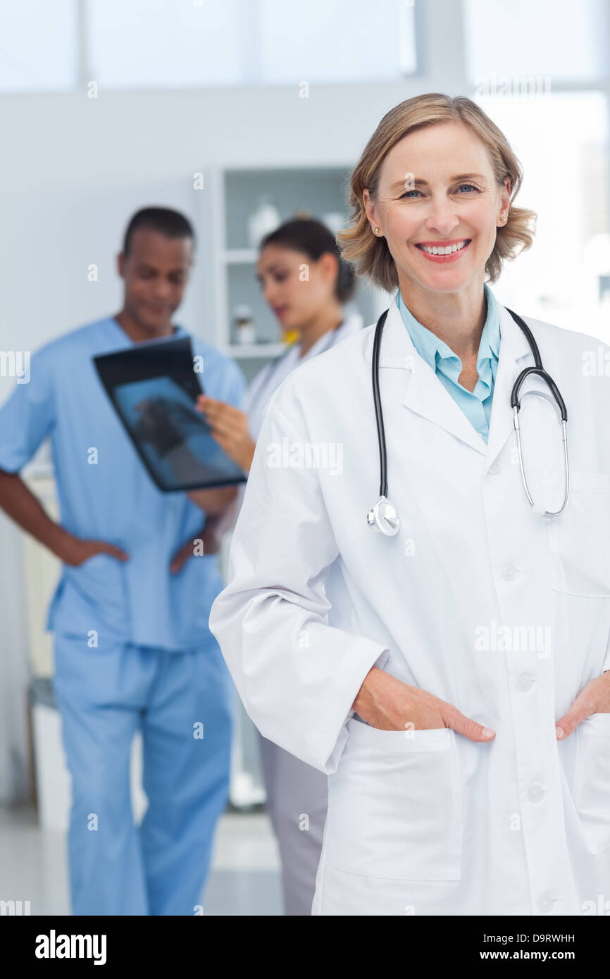 Doctor looking at the camera Stock Photo - Alamy