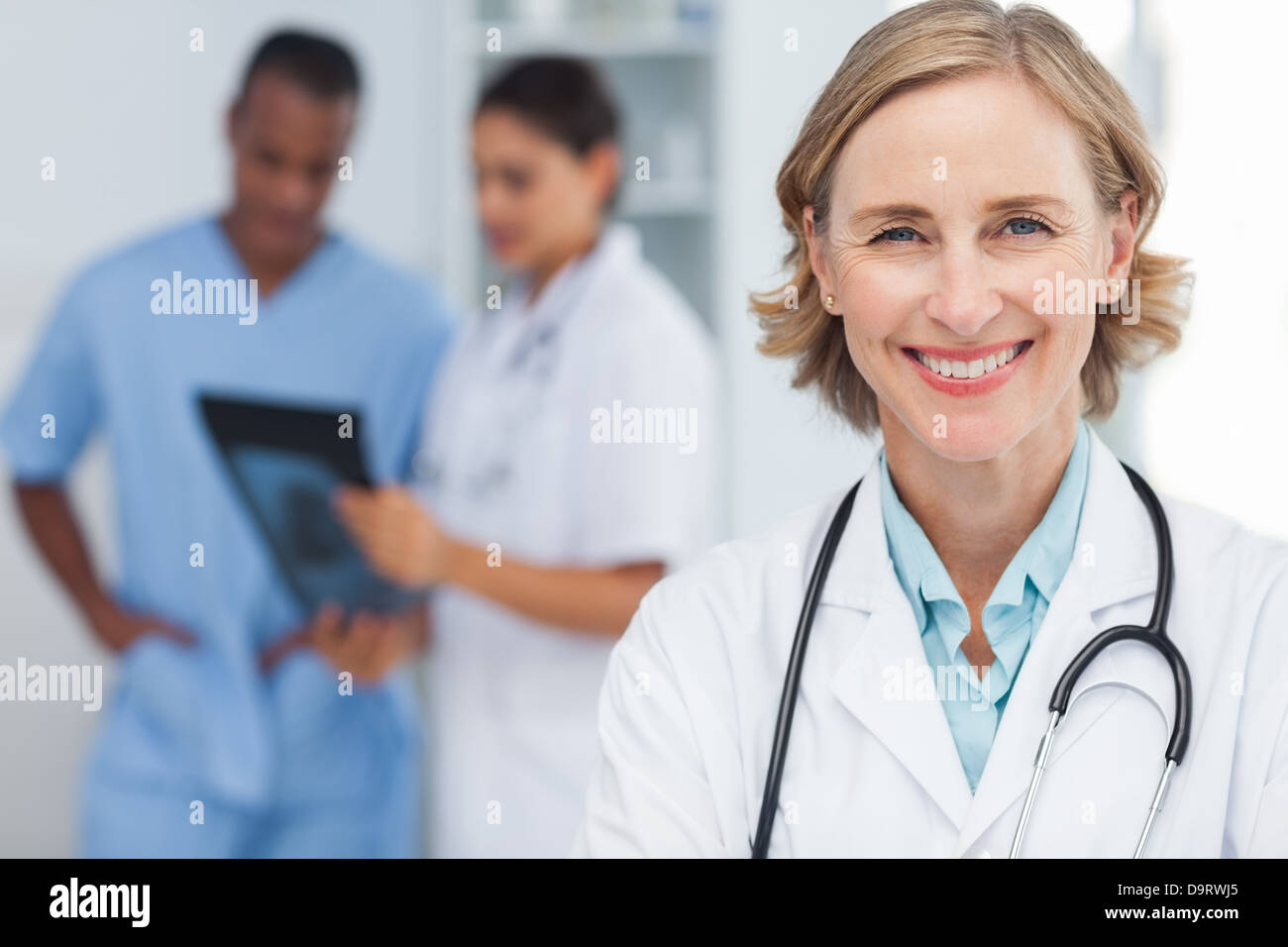 Smiling mature woman doctor nurse hi-res stock photography and images ...