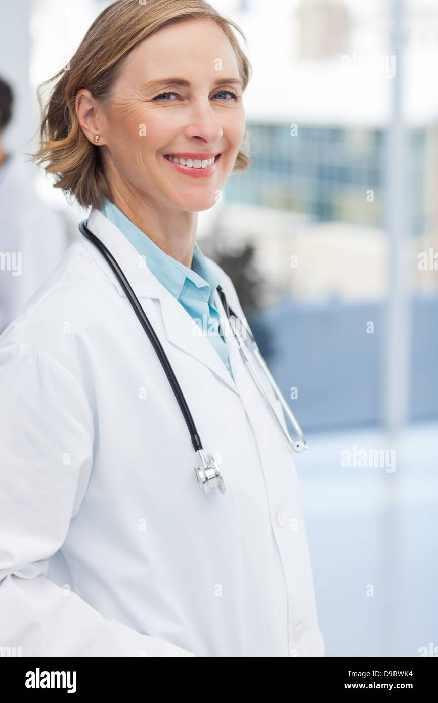 Smiling woman doctor with a stethoscope Stock Photo - Alamy
