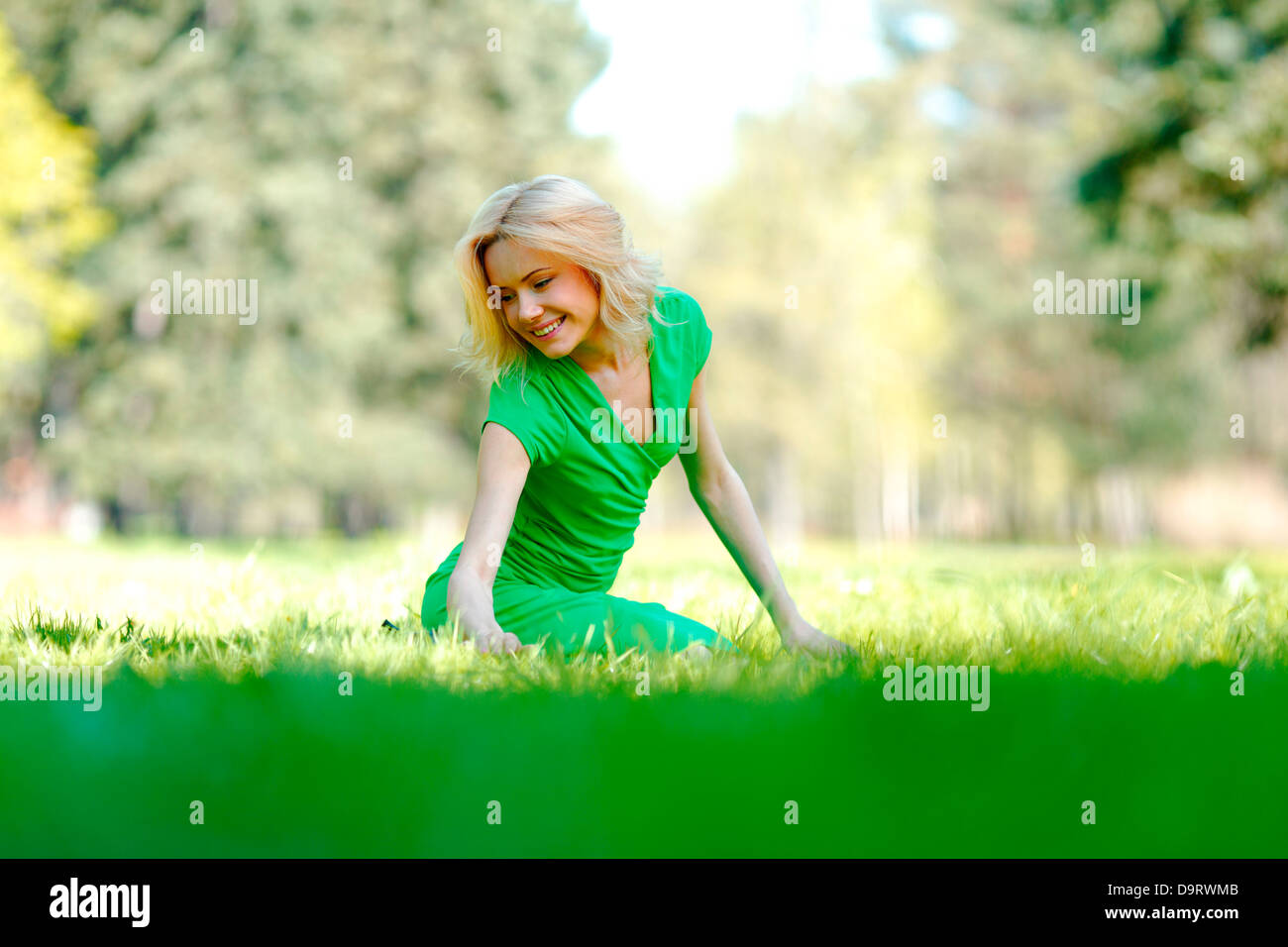 Beautiful young woman enjoy spring nature Stock Photo - Alamy