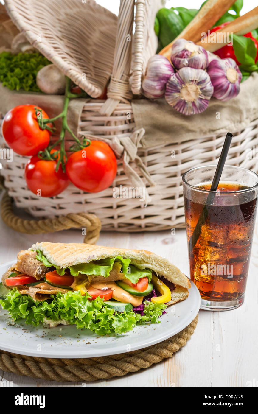 Kebab made of fresh vegetables and served with cold cola Stock Photo ...