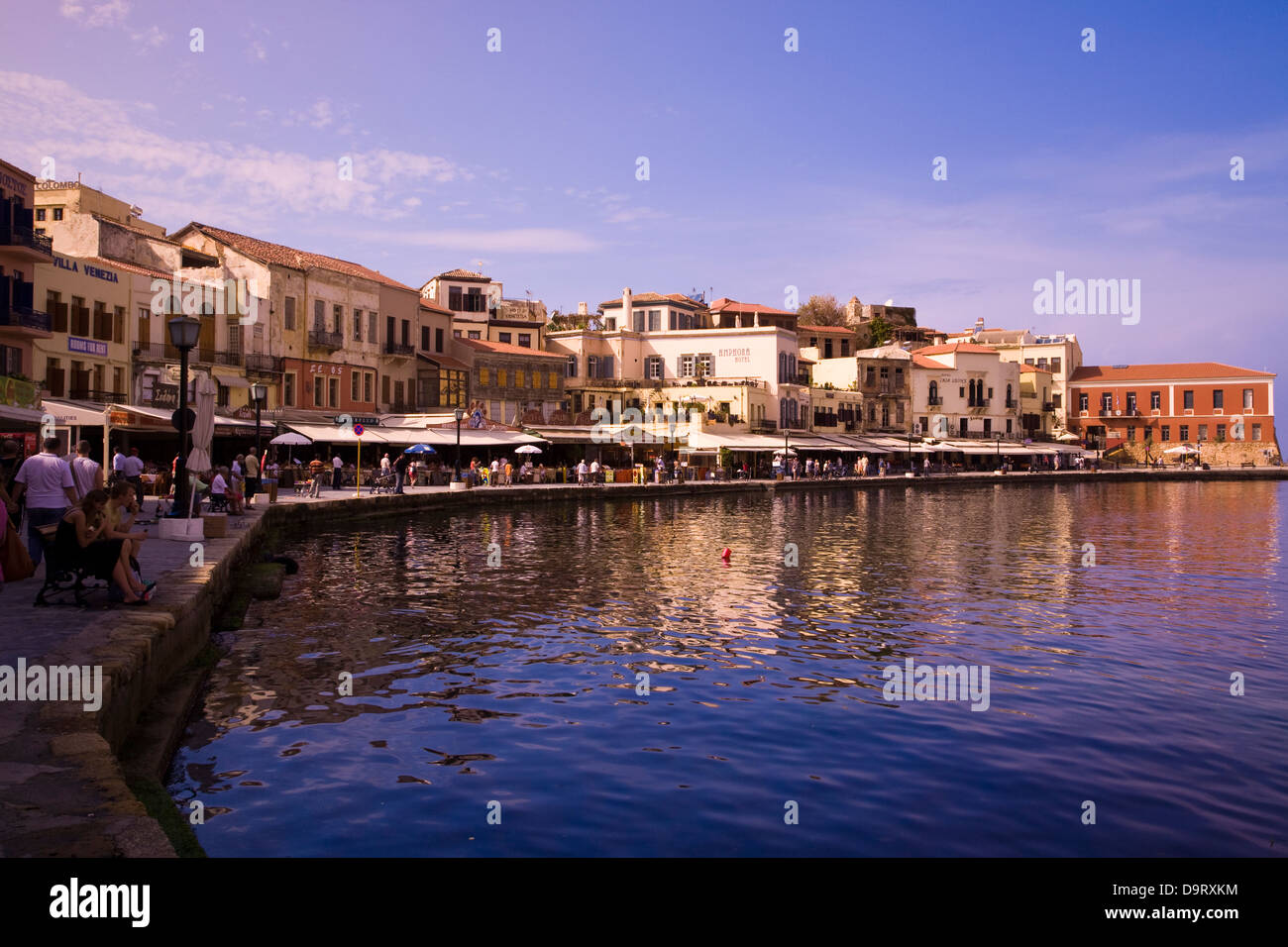 A broad promenade lined with tourist shops and cafes circles the lovely ...