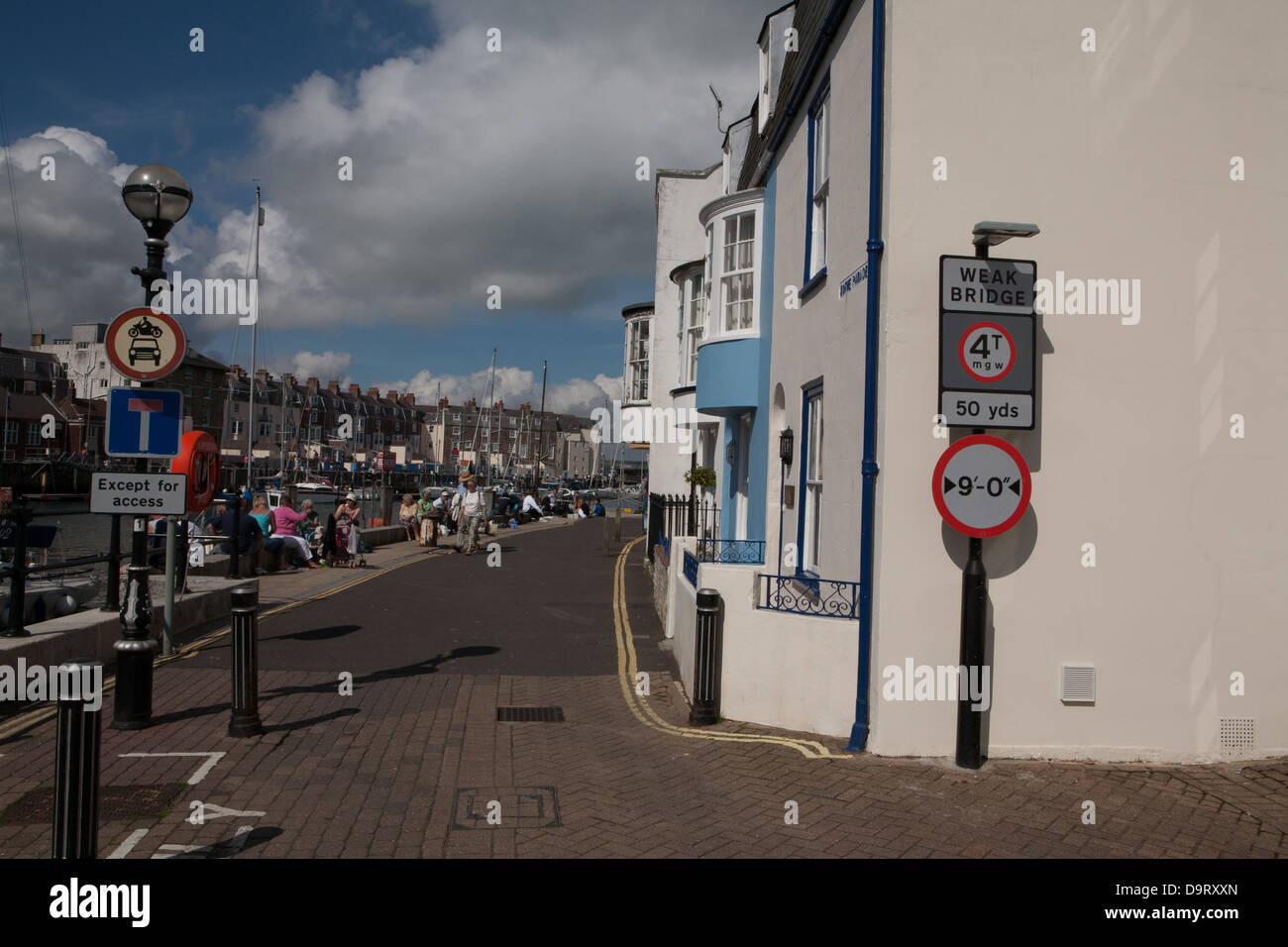 Harbour weymouth bollards sign street furniture hi-res stock ...