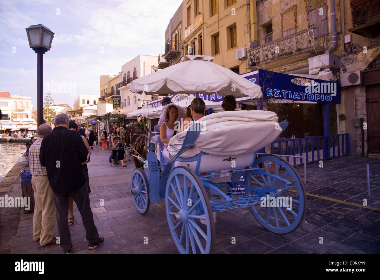 A broad promenade lined with tourist shops and cafes circles the lovely ...