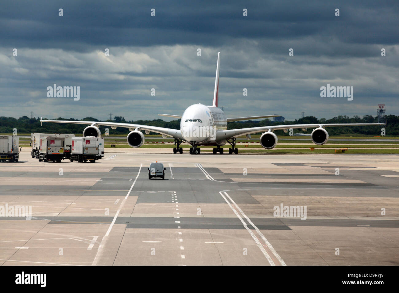 An Emirates Airline Airbus A380 Taxiing At Manchester Airport Stock ...