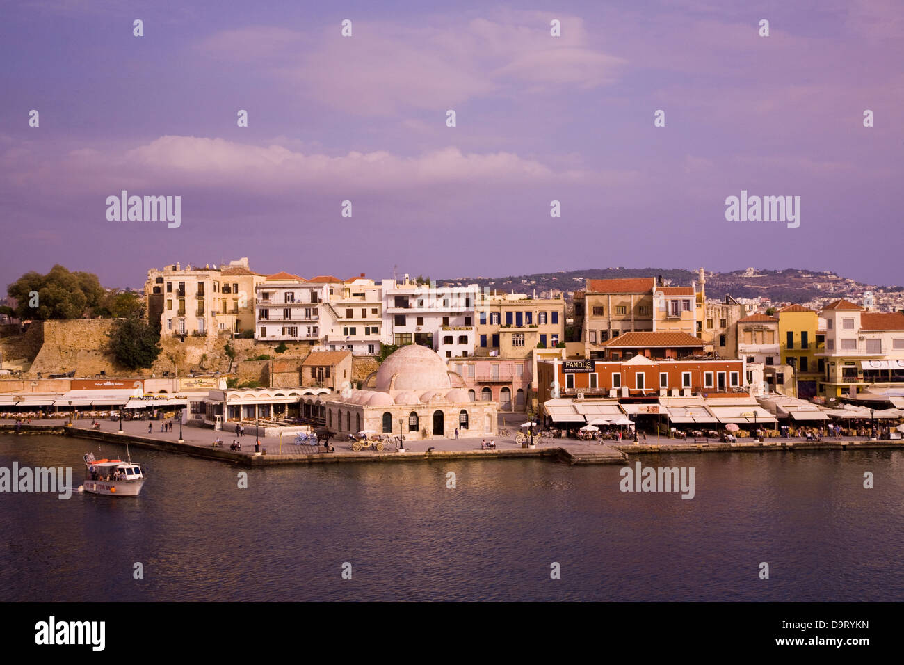 A broad promenade lined with tourist shops and cafes circles the lovely ...