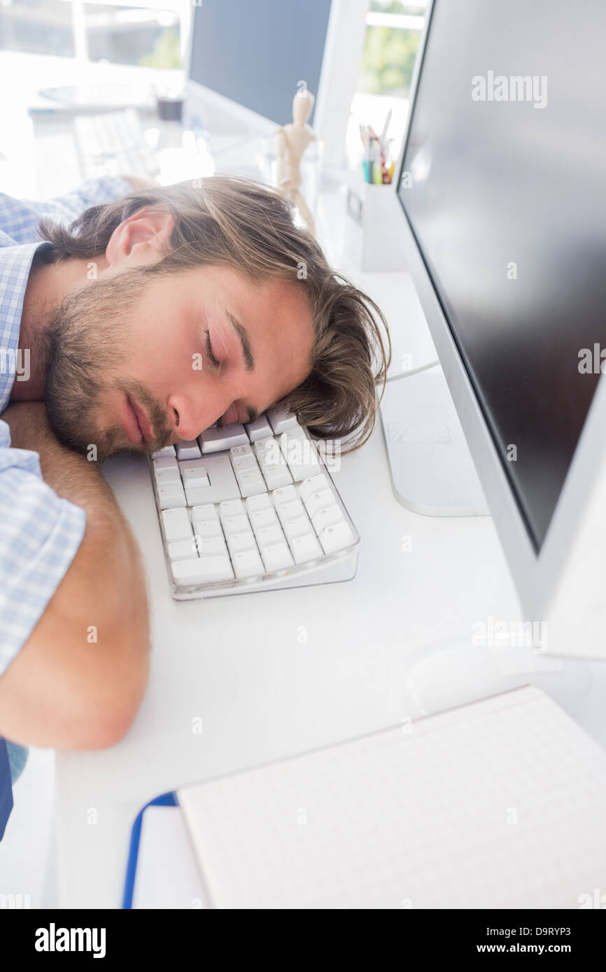 Man napping on his desk Stock Photo - Alamy